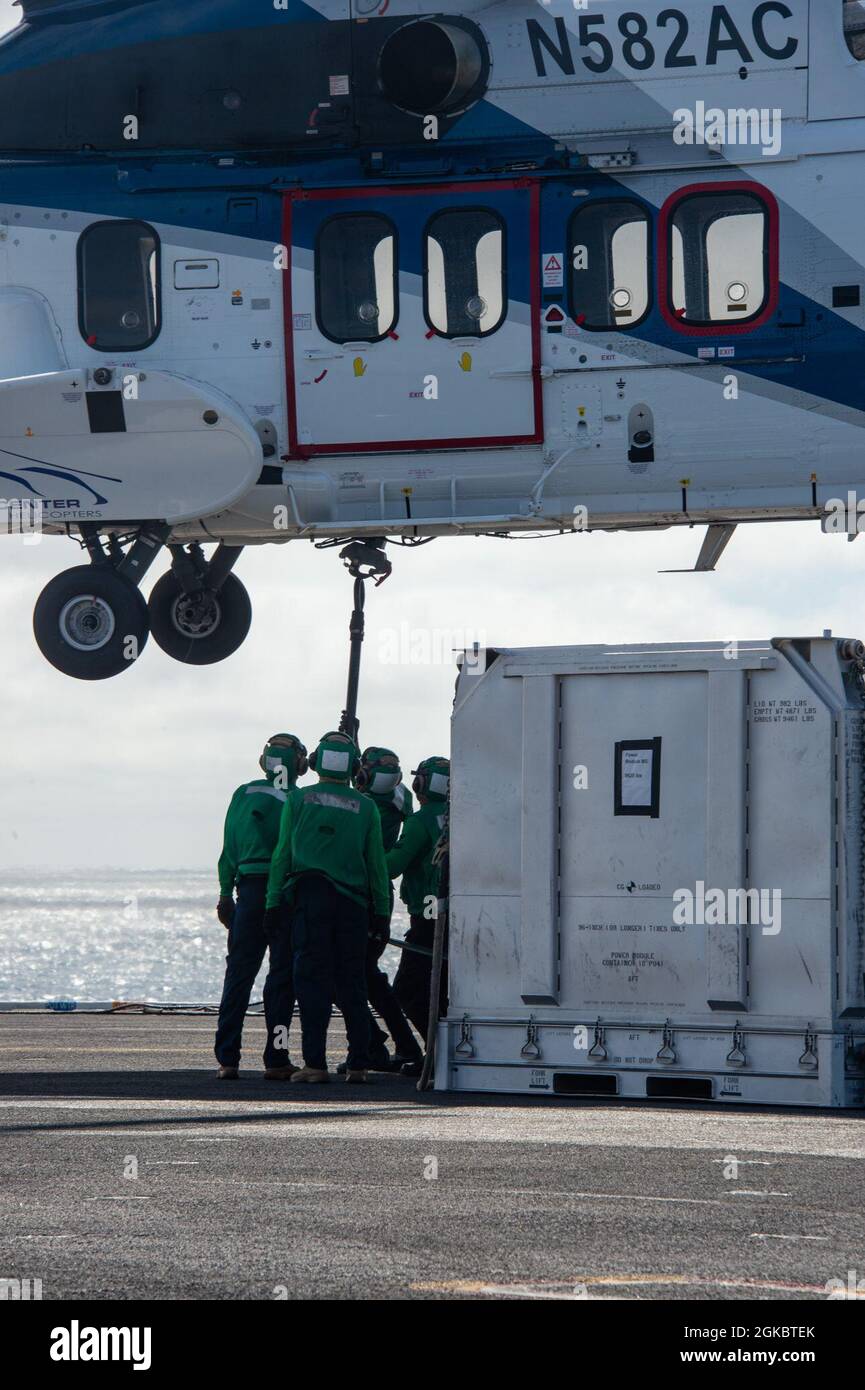 210306-N-LU761-2088 PACIFIC OCEAN (Mar. 6, 2021) Sailors connect a mock ...