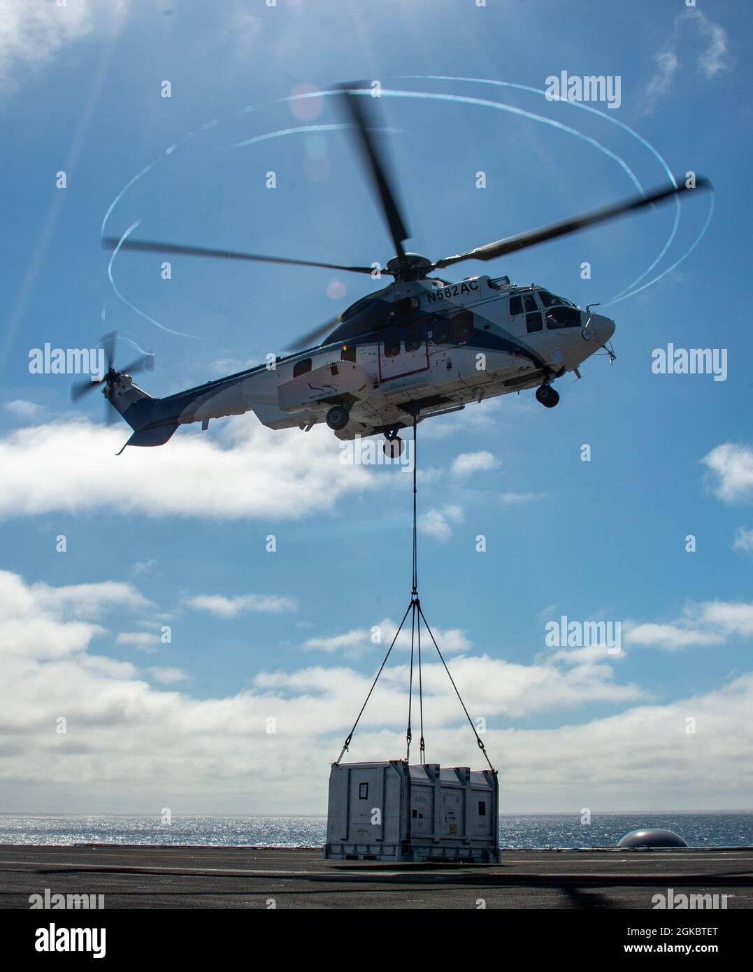 210306-N-LU761-2102 PACIFIC OCEAN (Mar. 6, 2021) A civilian H225 Super ...