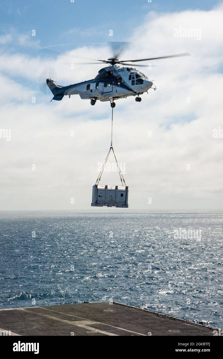 210306-N-GW654-1625 PACIFIC OCEAN (Mar. 6, 2021) A civilian H225 Super ...