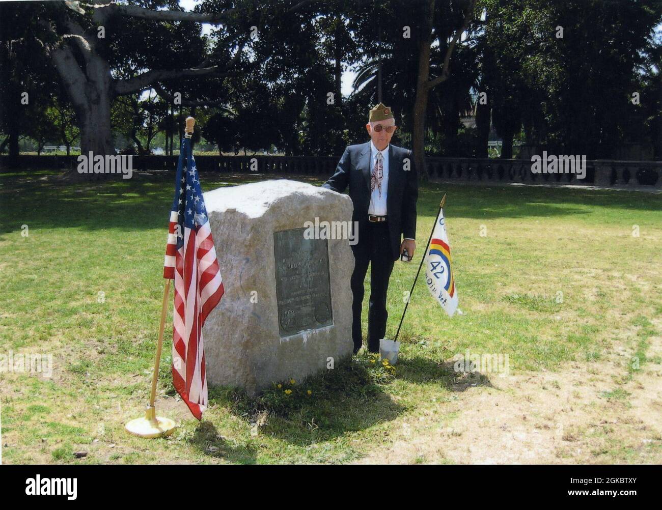 James Davis, son of F company's 1st Sgt. Arthur C. Davis, standing next ...