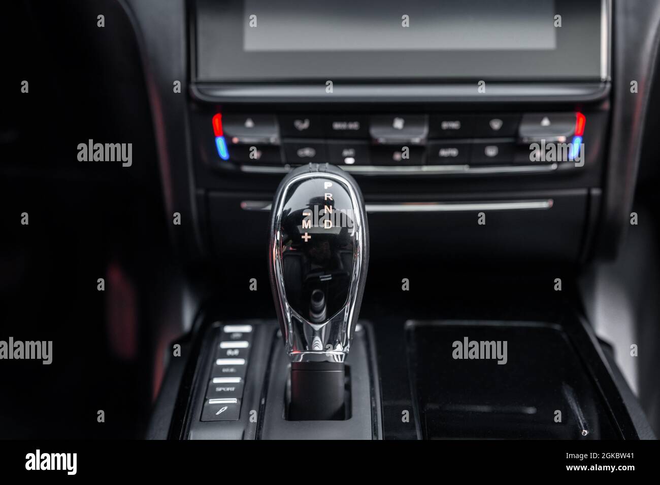 Detail of an automatic gear shifter in a new, modern car. Cockpit ...
