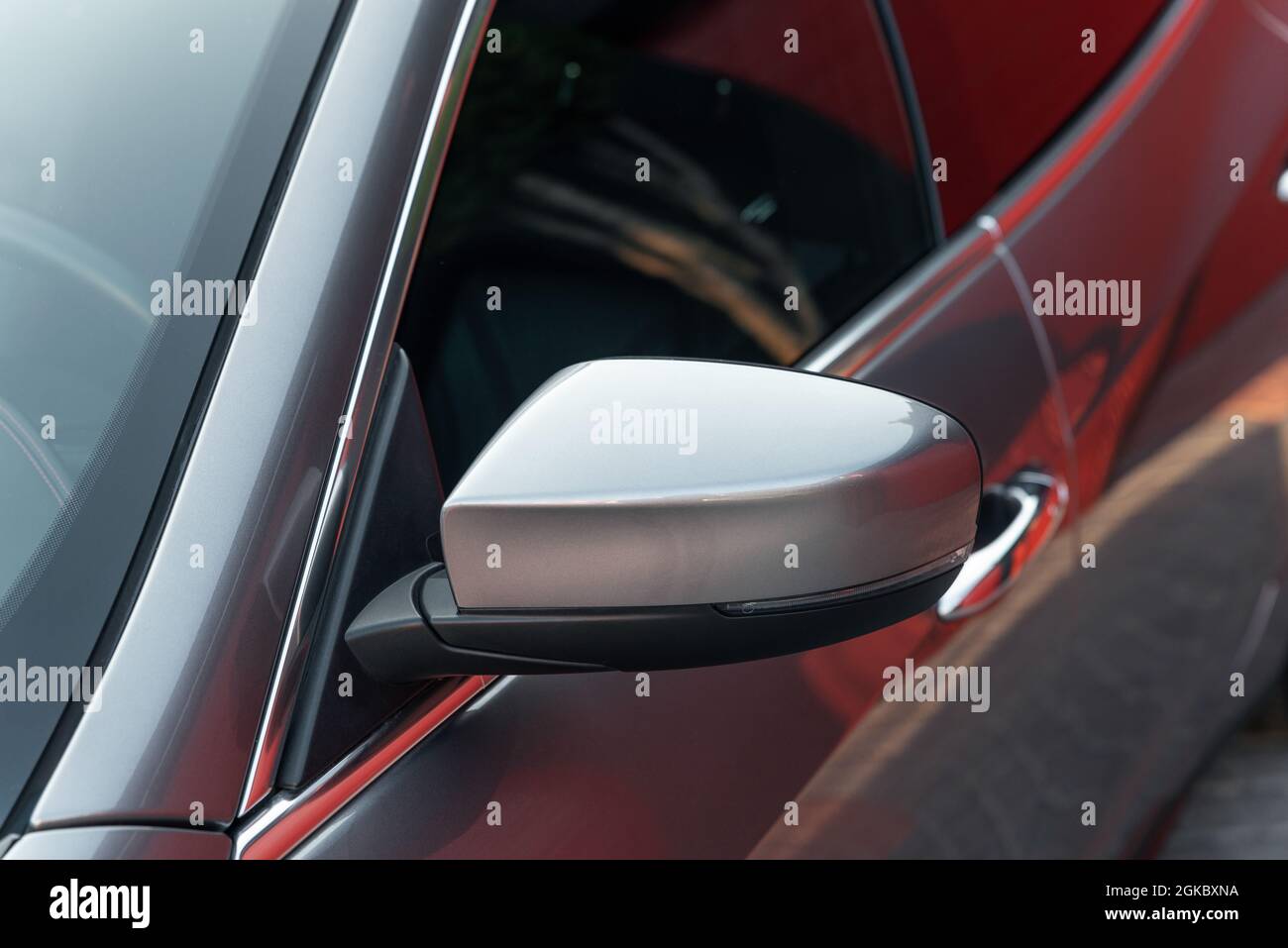 Front side view of metallic color modern sports car close up. Rearview ...
