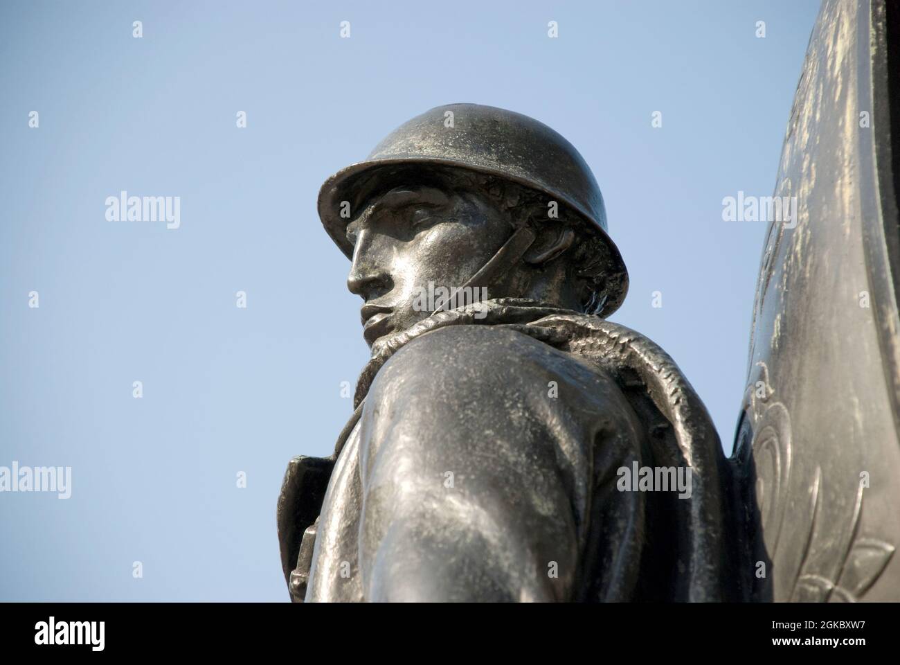 Low angle view of big metal statue of a soldier Stock Photo - Alamy