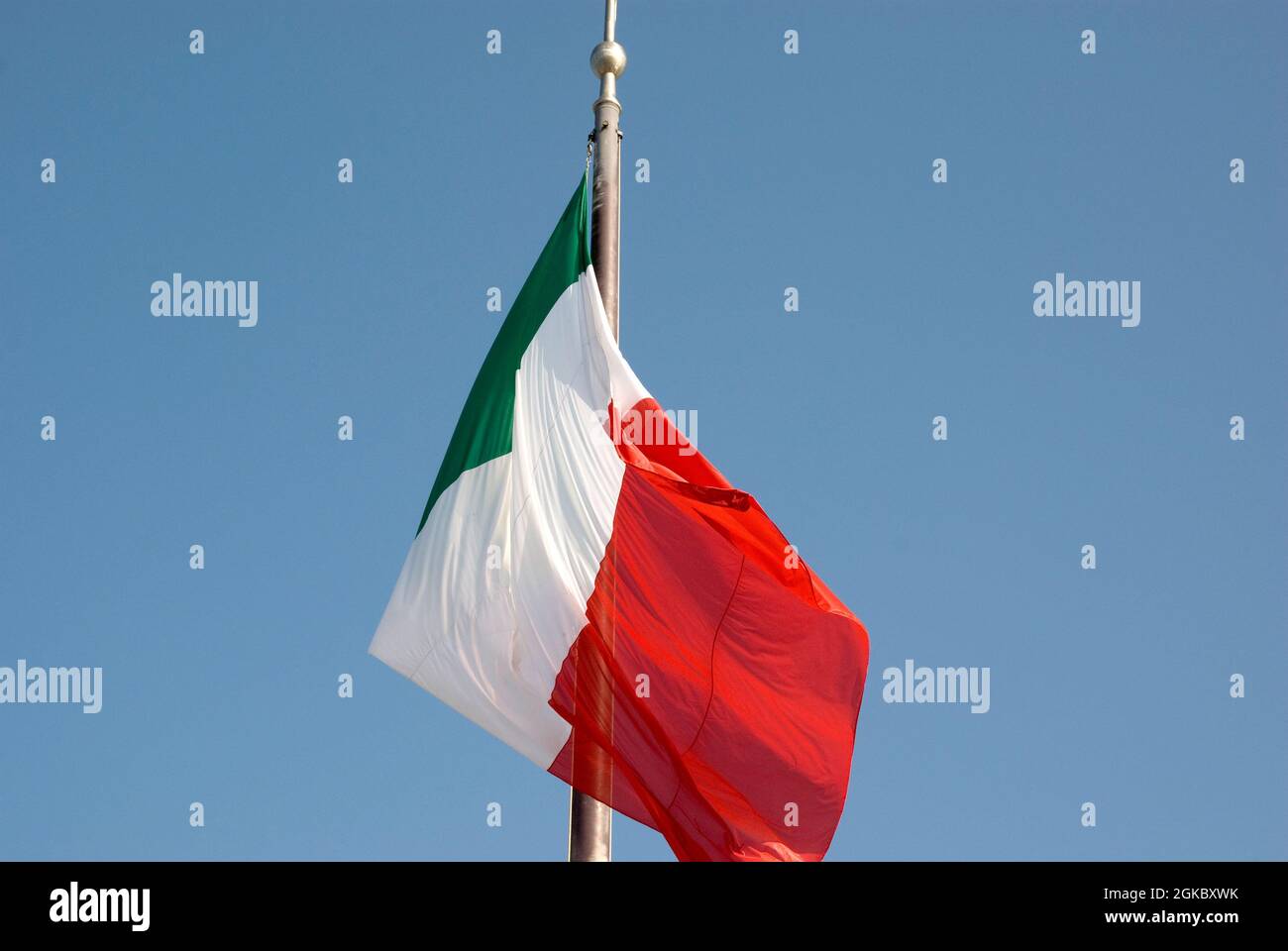 Italian flag hanging on a pole Stock Photo - Alamy