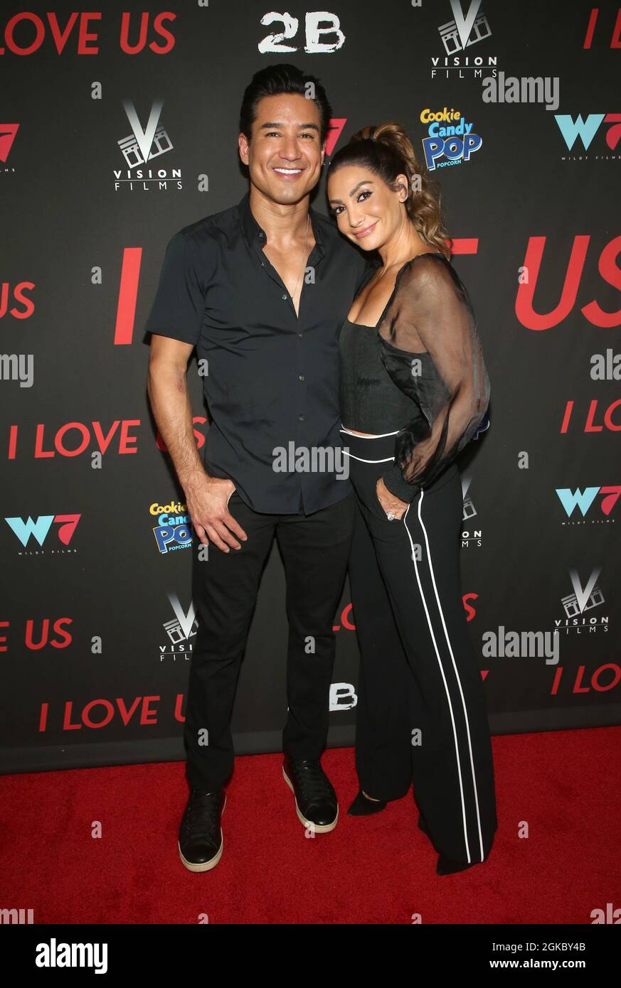 West Hollywood, Ca. 13th Sep, 2021. Mario Lopez, Courtney Lopez, at the ...
