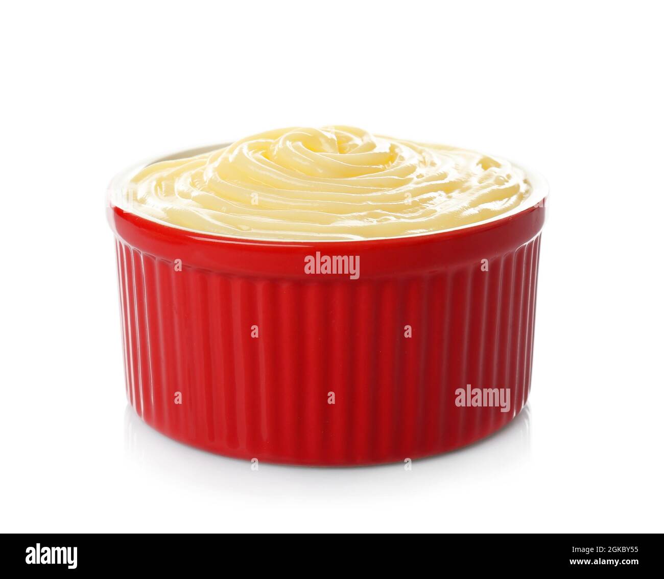 Vanilla pudding in red bowl isolated on white Stock Photo - Alamy