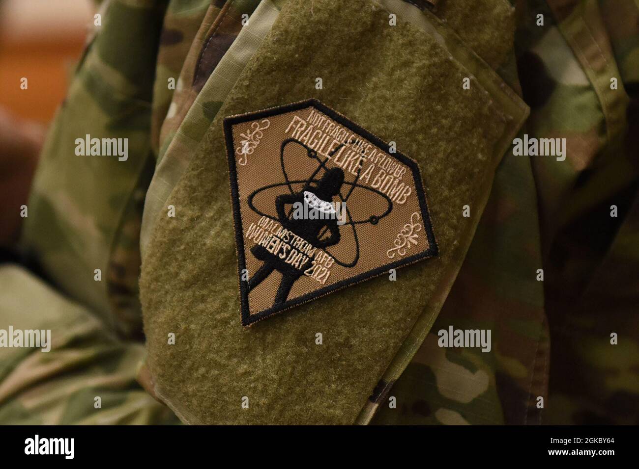 The International Women's Day morale patch is worn by a female Airman ...