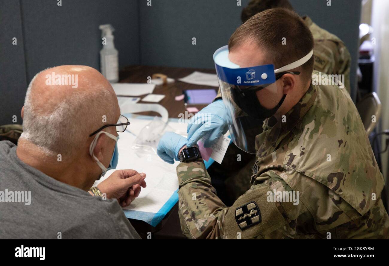 U.S. Army Spc. Melvin Amos, a Casa Grande, Arizona, native and a nurse ...
