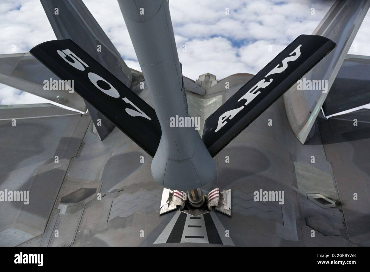 An F-22 Raptor Demonstration Team pilot refuels with a KC-135 ...