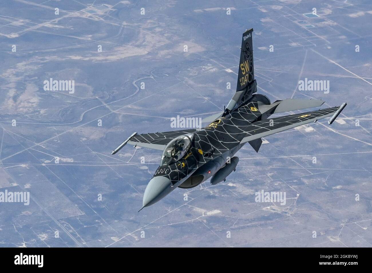 An F-16 Viper Demonstration Team pilot flies behind a KC-135 ...