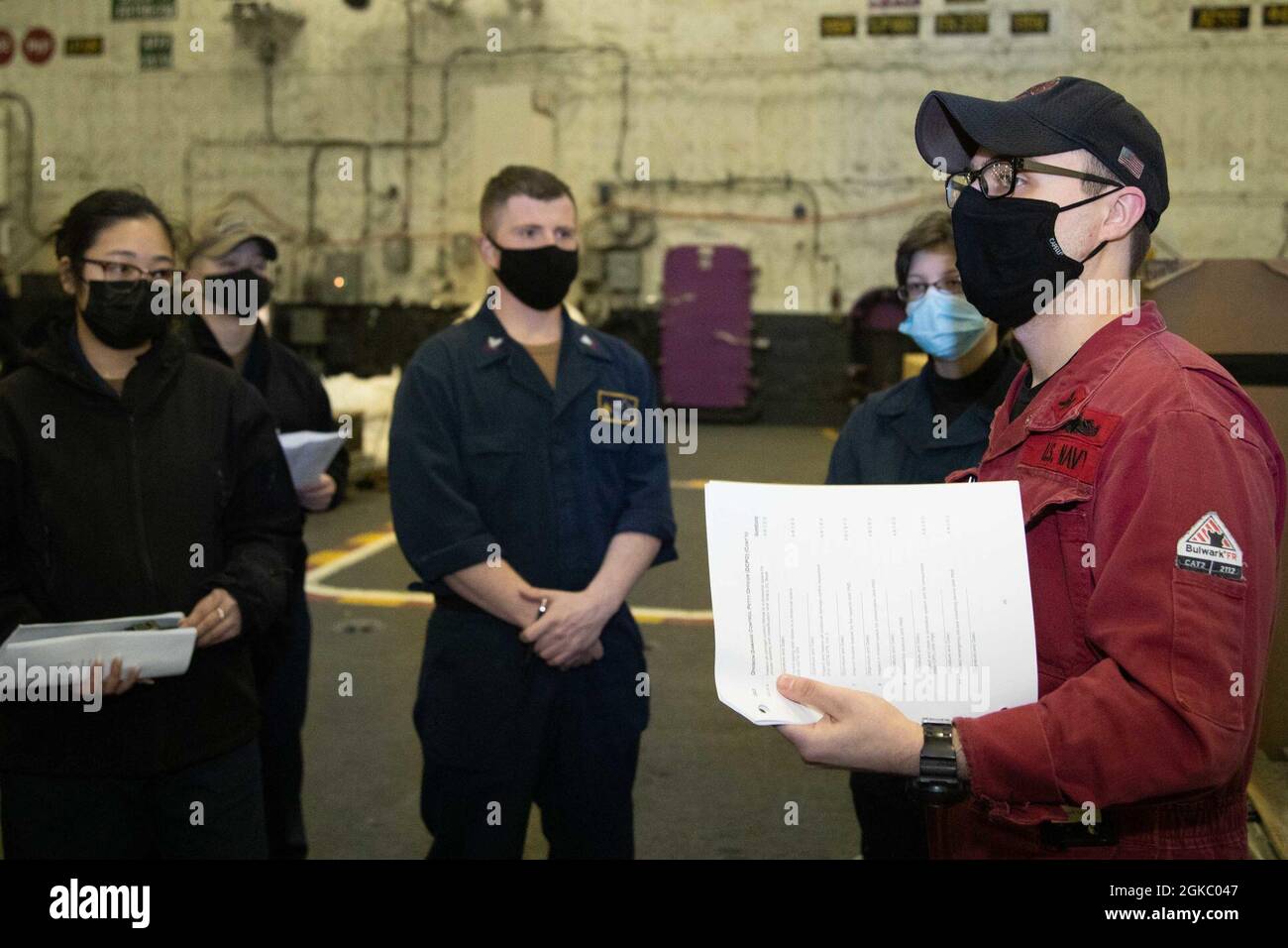 Damage Controlman 2nd Class Tyler Eckhoff, from Long Island, New York ...