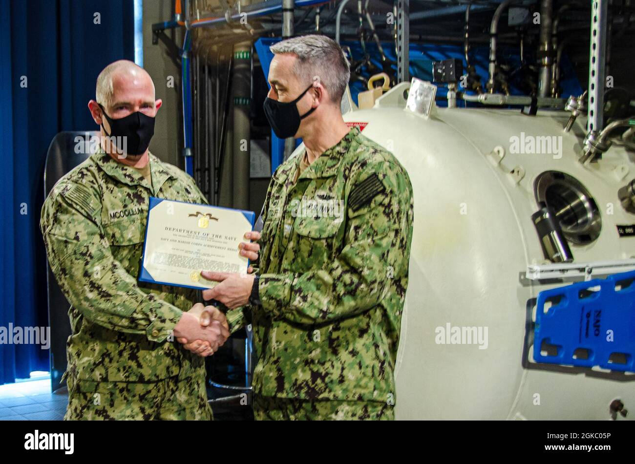 Chief Navy Diver Kenneth L. McCollum was presented with the Submarine ...