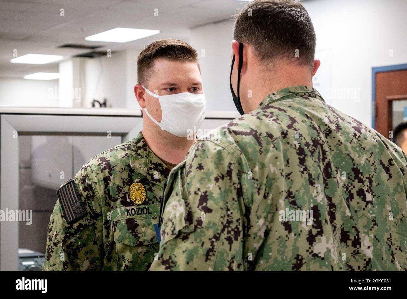 WASHINGTON, DC (March 8, 2021) – Capt. Grahame Dicks (center), Naval ...