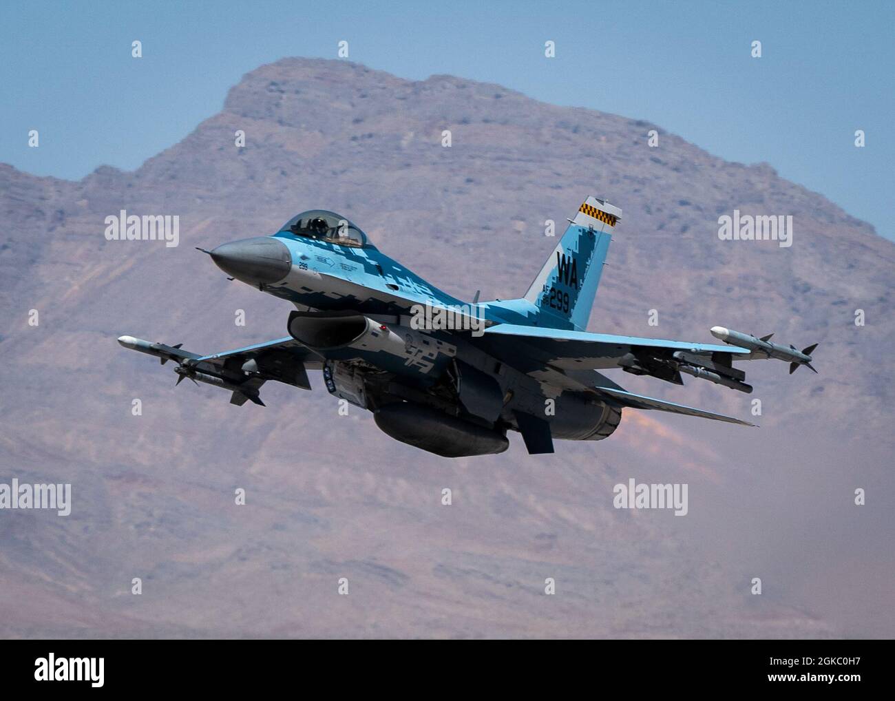 An F-16 Fighting Falcon assigned to the 64th Aggressor Squadron at ...