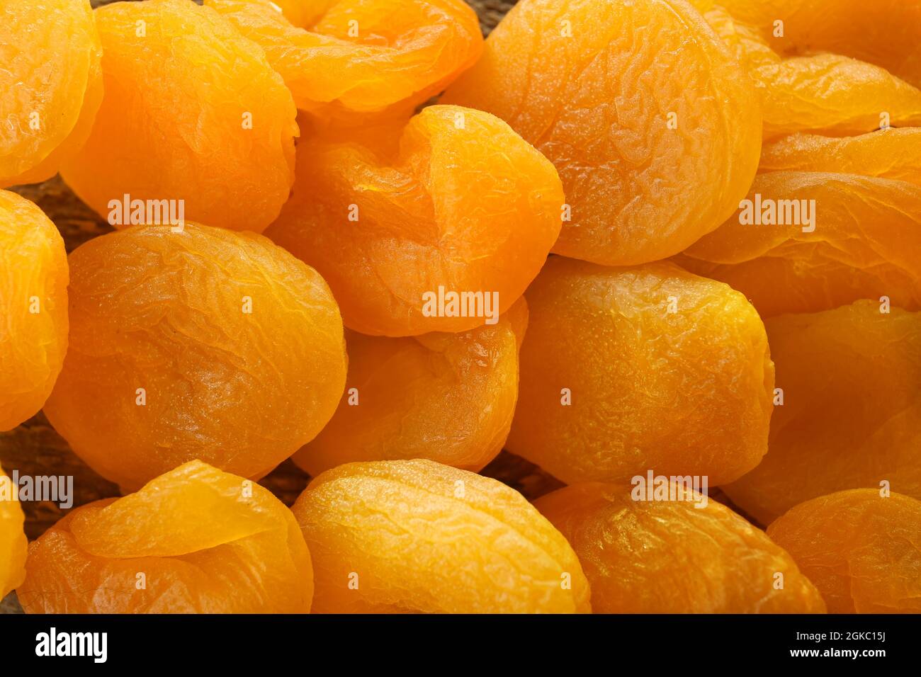 Dried apricots as background Stock Photo - Alamy