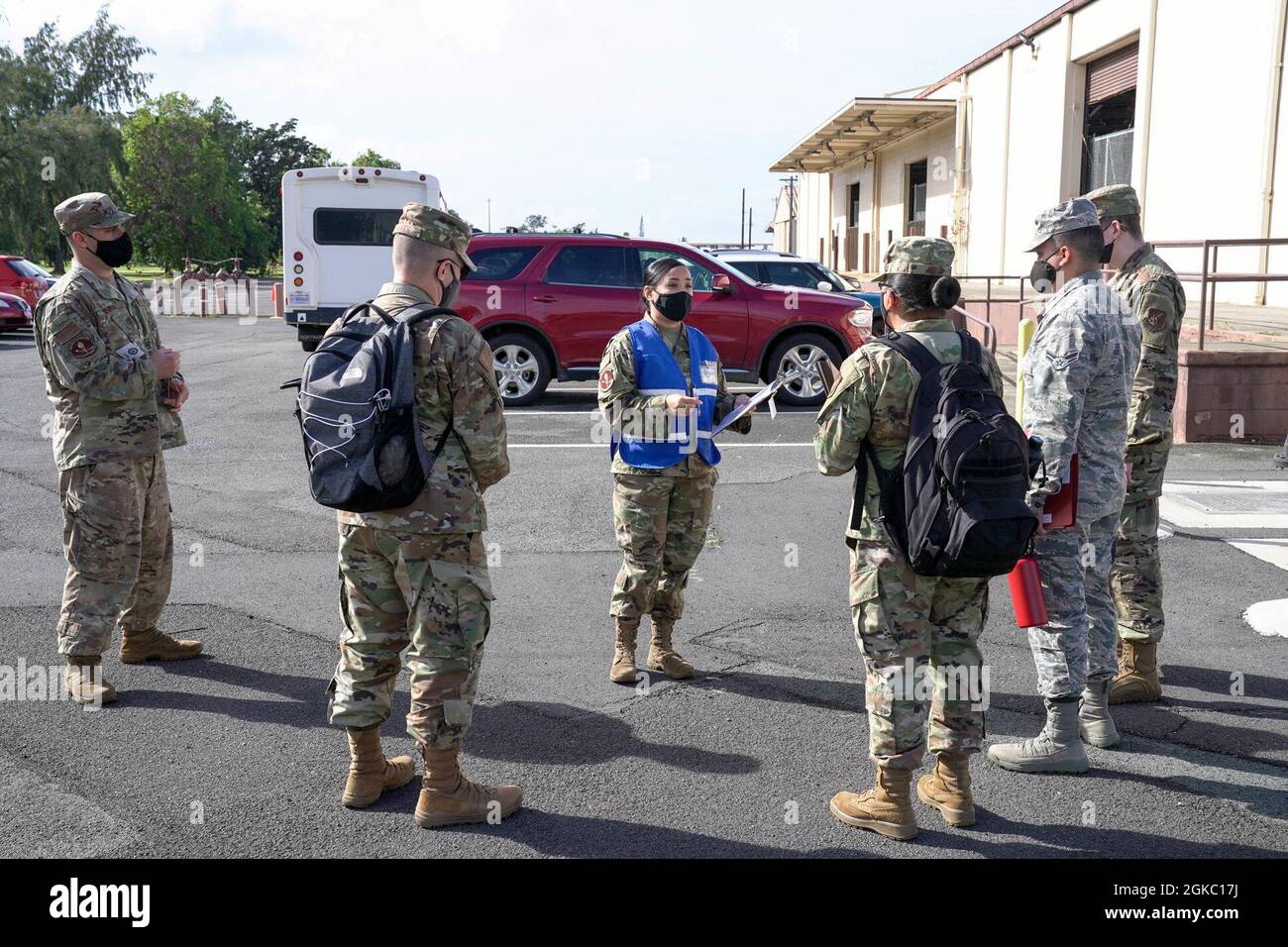Airmen participating in a deployment exercise from the 15th Wing check ...