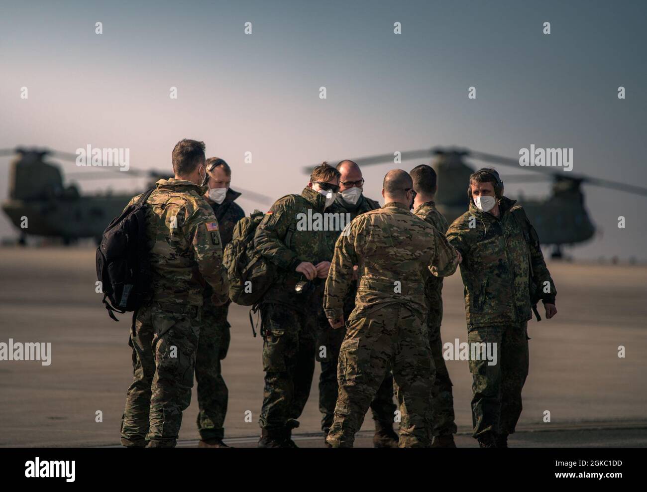 After exiting a German NH-90 helicopter, Bundeswehr RFD planners ...