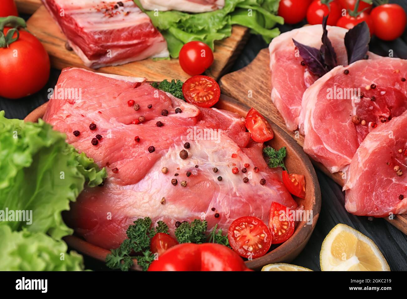 Different types of raw meat on table, closeup Stock Photo - Alamy