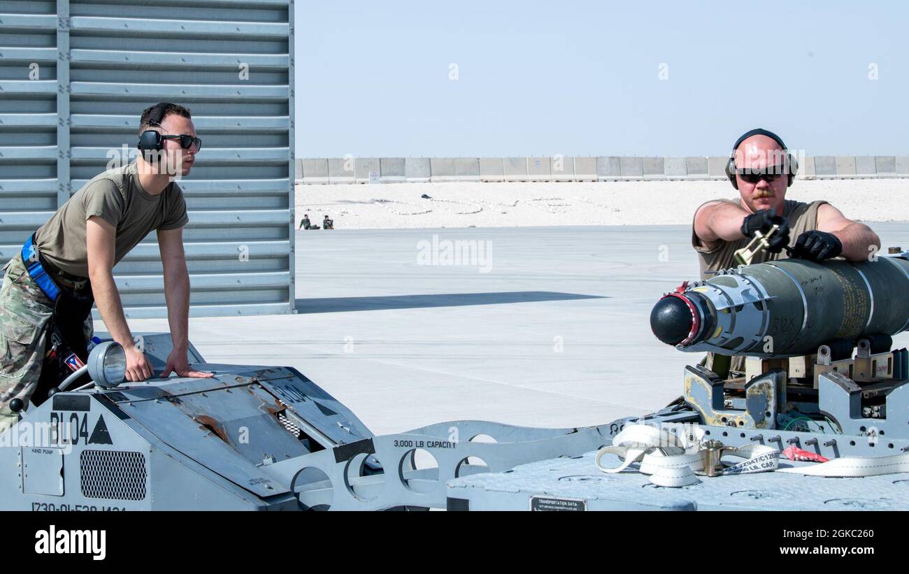 Airmen from the 379th Expeditionary Maintenance Squadron munitions ...