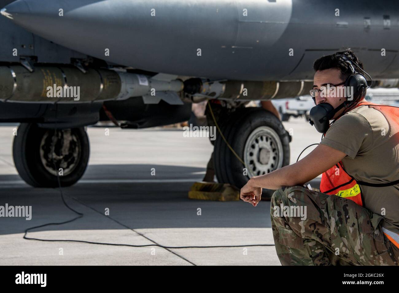 A U.S. Air Force crew chief prepares to launch an F-15E Strike Eagle ...