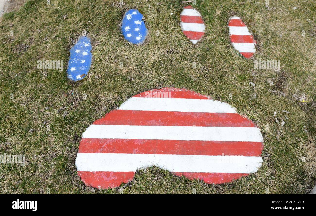 A red, white, and blue paw print can be seen outside the entrance to ...