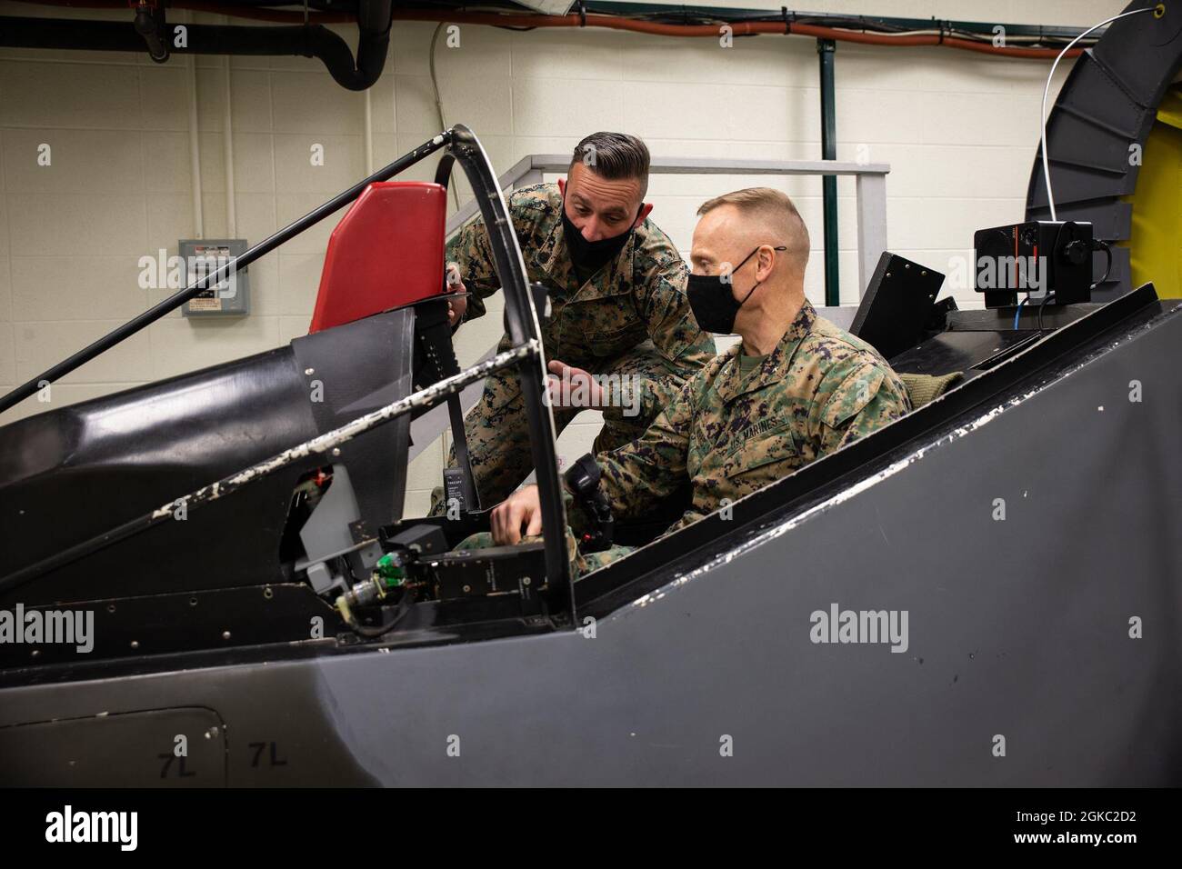 U.S. Marine Corps Staff Sgt. Shawn Neal (left), an instructor assigned ...