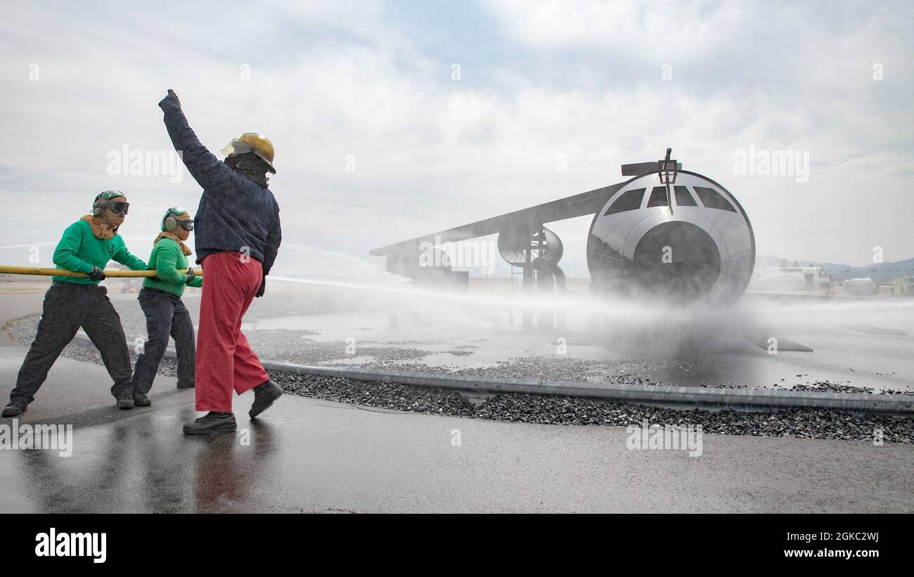 U.S. Navy Sailors with Fleet Logistics Support Squadron (VRC) 30, DET-5 ...
