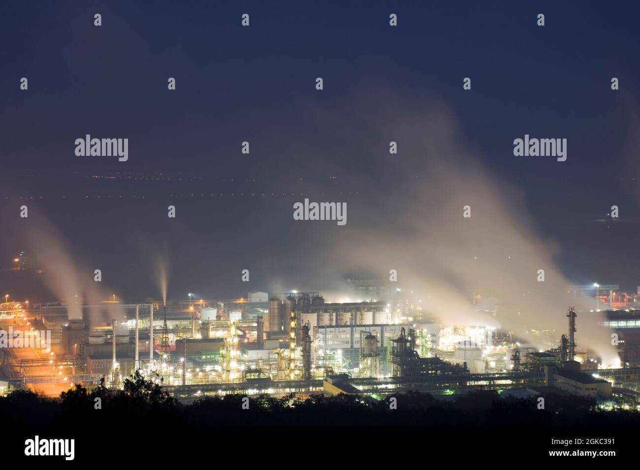 Bright smoking factory in the evening top view. Kazincbarcika, Hungary ...