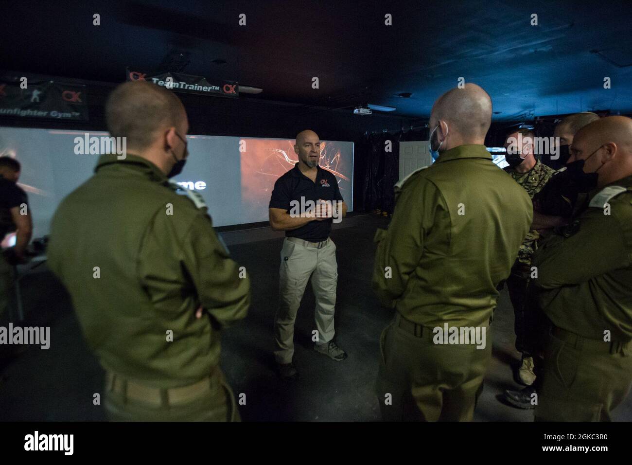 Vince Pope, a program manager with Conflict Kinetics, speaks to Israeli ...