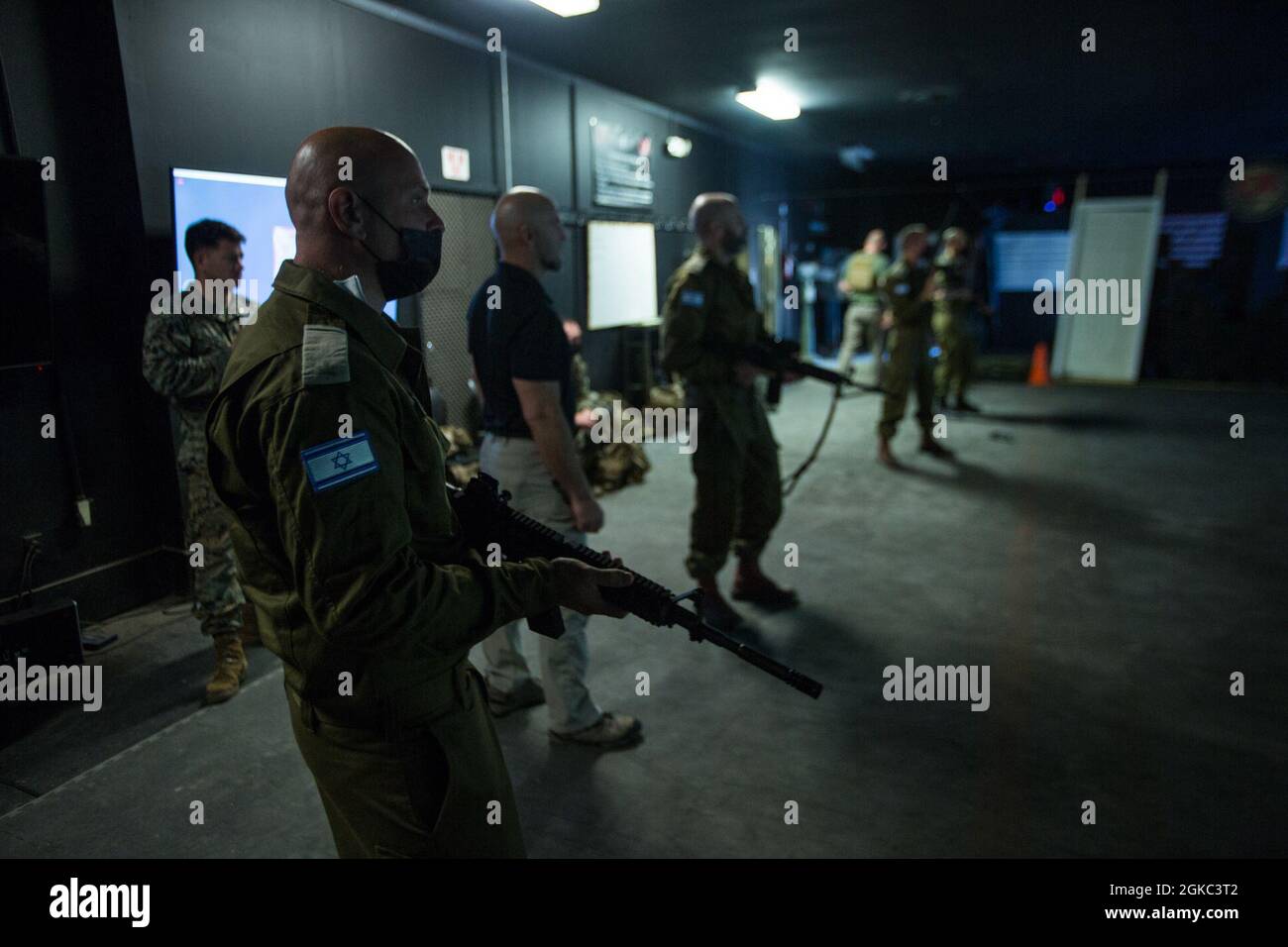 Israeli Defense Forces leaders practice firing on a simulator during a ...