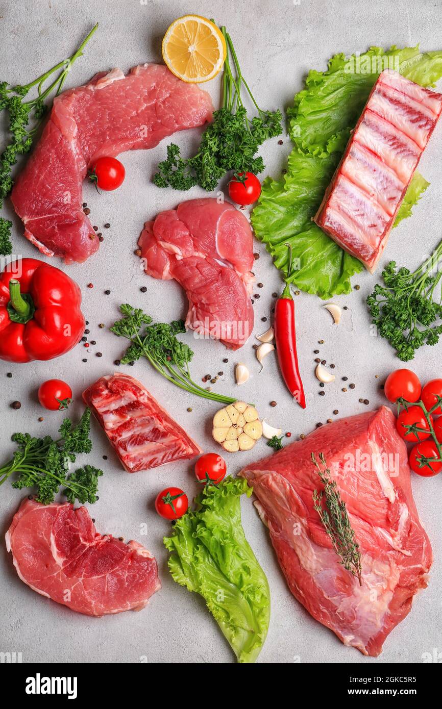 Different types of meat on table Stock Photo - Alamy