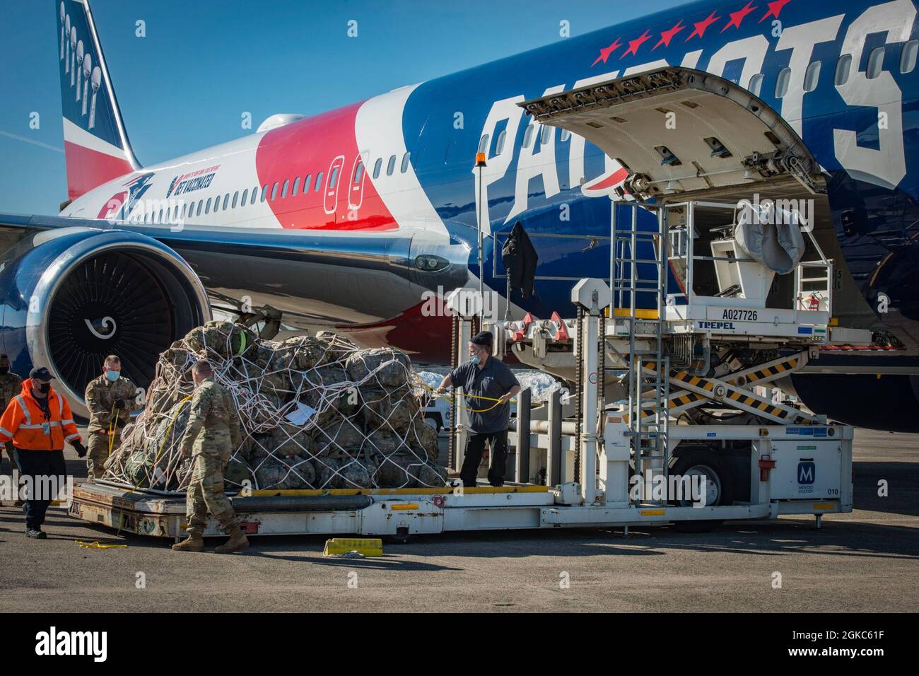 Airmen from the 103rd Logistics Readiness Squadron assist civilian ...