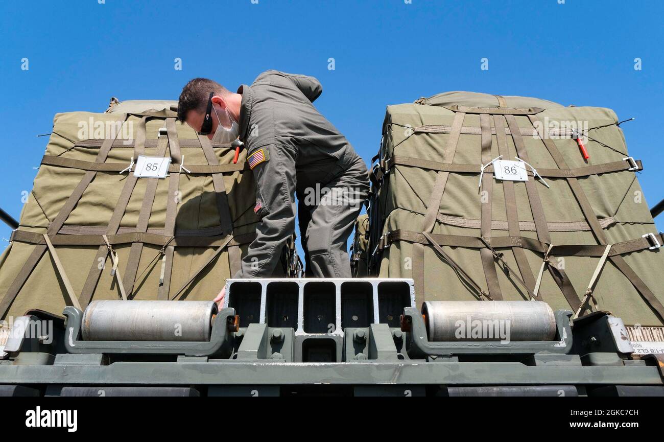 Tech. Sgt. Barney Barnette, 36th Airlift Squadron loadmaster, checks ...
