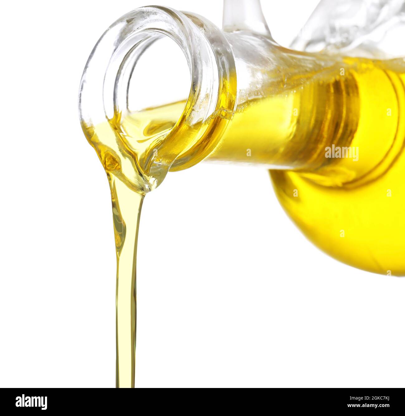 Pouring cooking oil from pitcher on white background, closeup Stock ...