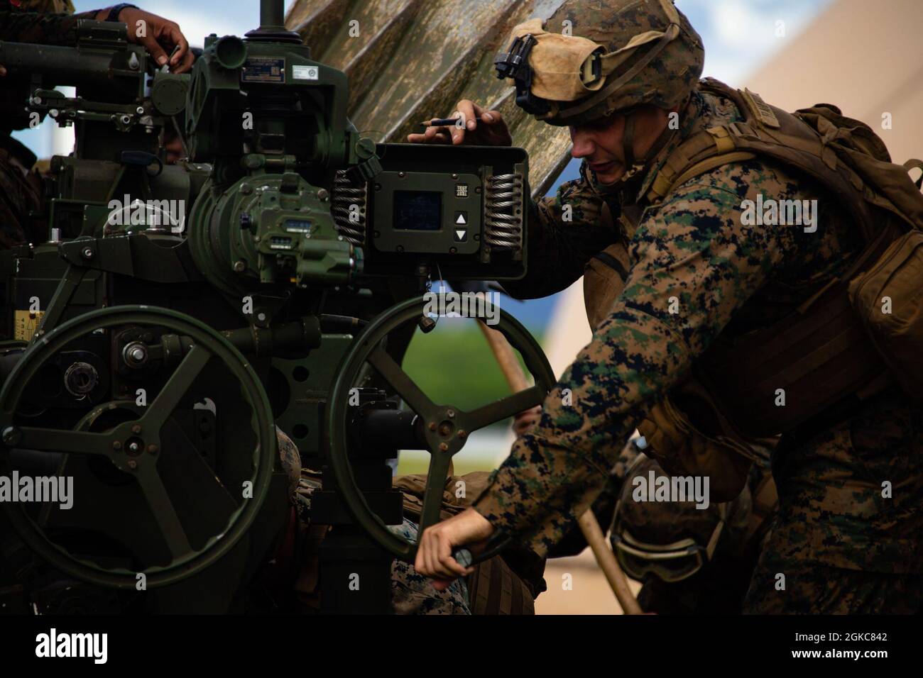 U.S. Marine Corps Lance Cpl. Christopher Flaherty, a gunner with Alpha ...