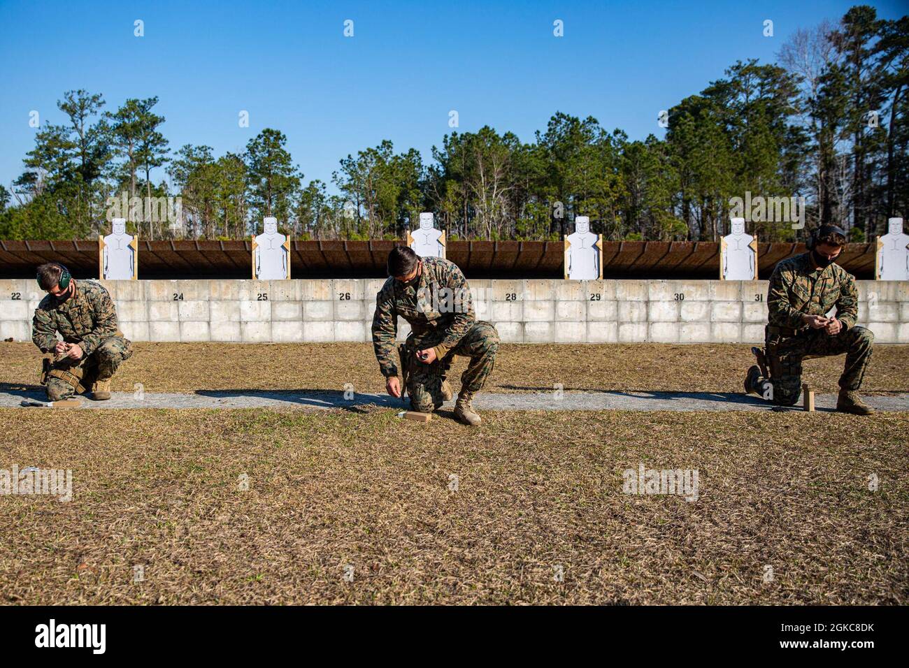 U.S. Marines load M9 pistol magazines during the 2021 Marine Corps Base ...