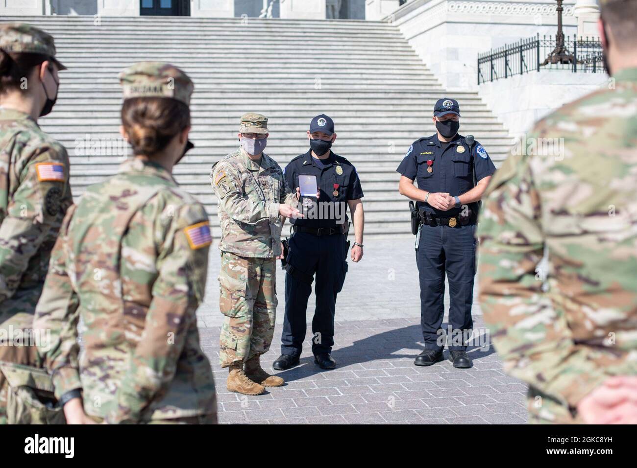 U.S. Army Col. Chris McKinney, center, commander, 177th Military Police ...