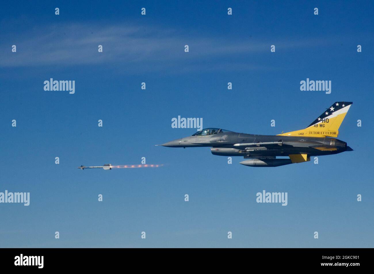 An F-16 from Holloman Air Force Base, 49th Wing, fires an AIM-9M at ...