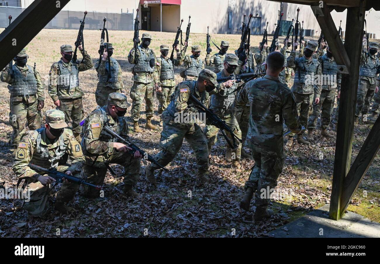 U.S. Army Soldiers perform a weapons count to maintain accountability ...