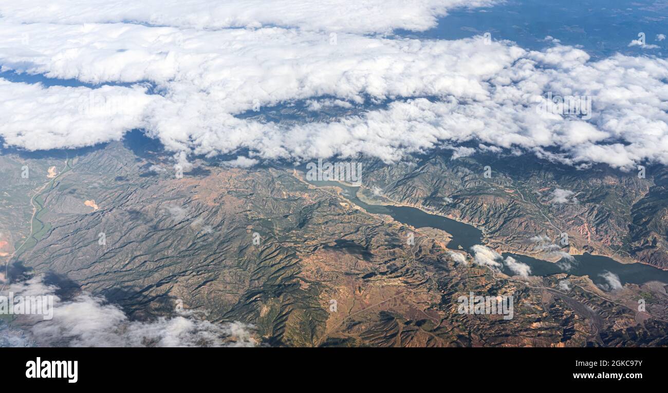 the mountains of Turkey and the clear blue sky with white clouds, a ...