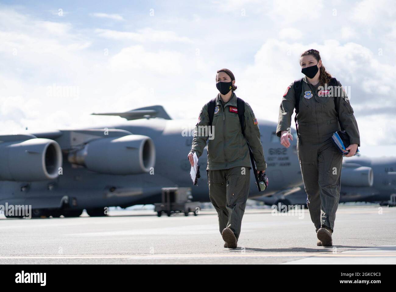 U.S. Air Force Maj. Amanda Robillard, left, 22nd Airlift Squadron C-17A ...