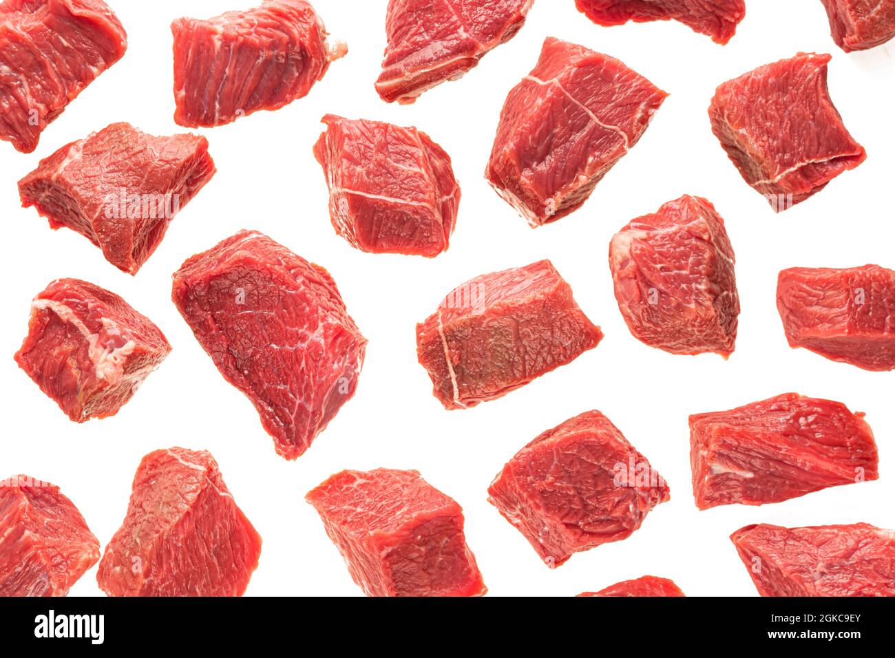 Large pieces of beef meat on a white background of isolate. sliced red ...