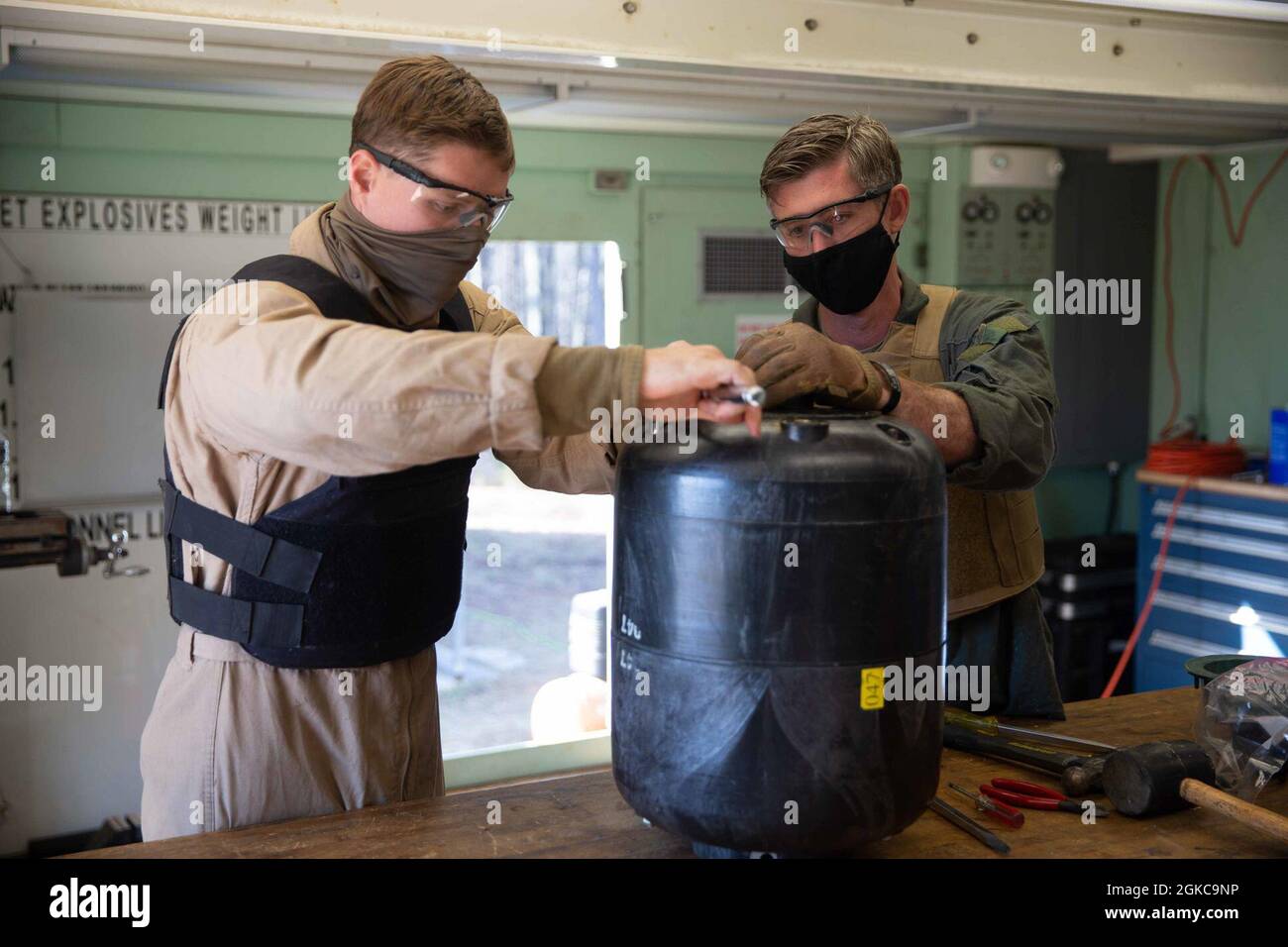 U.S. Marine Corps Sgt. Ross Frizzell, and Gunnery Sgt. Curt Bartz ...