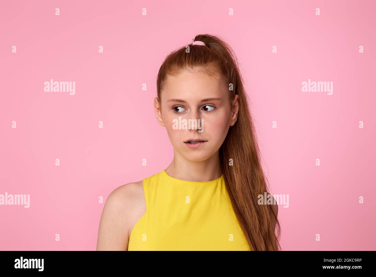 sad teen girl on green background. Human emotions Stock Photo - Alamy