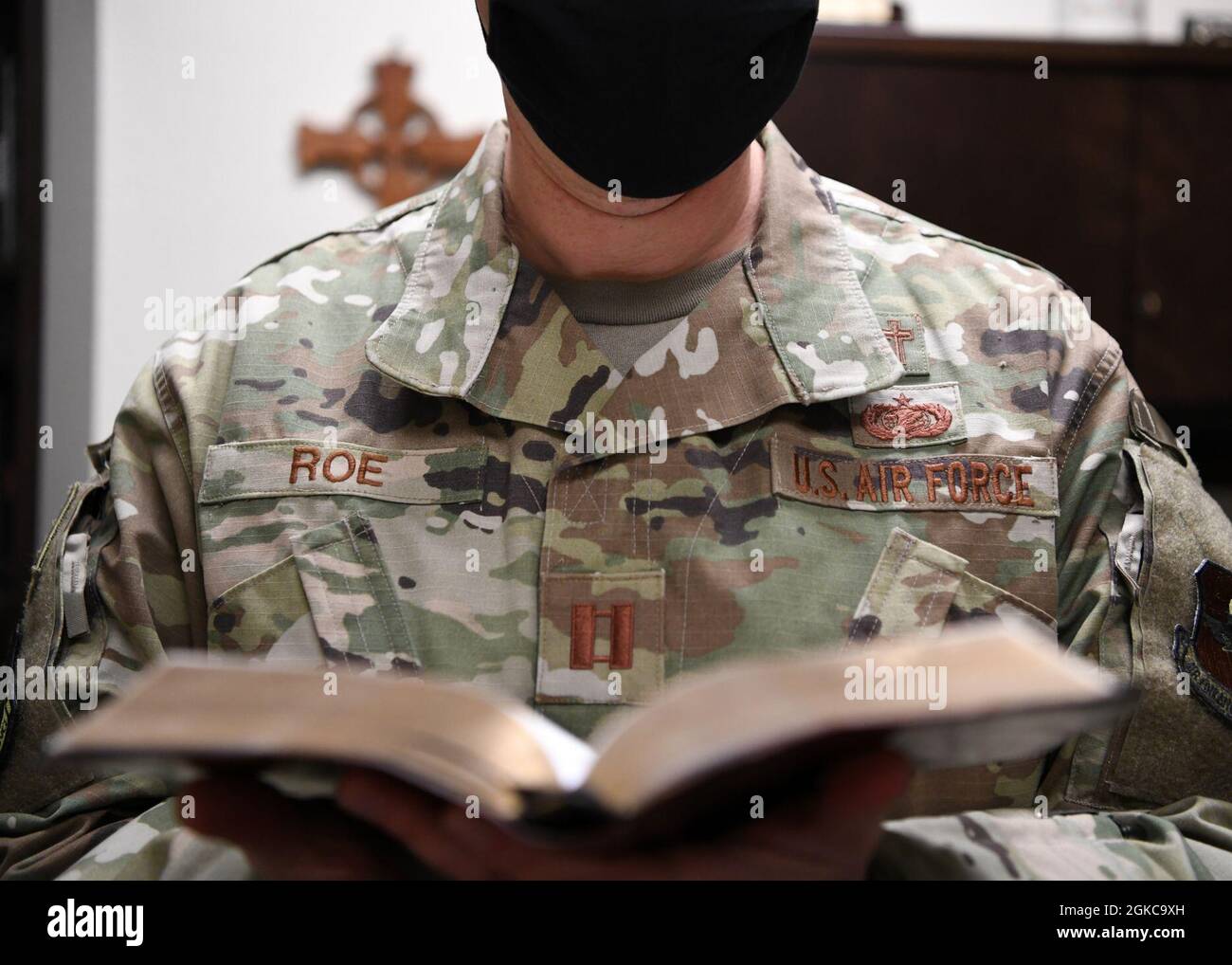 Capt. Adam Roe, 56th Fighter Wing chaplain, shares a passage from a ...