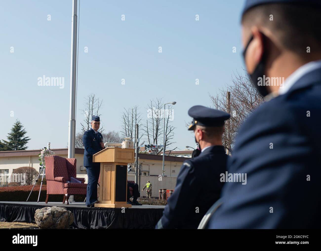 Col. Andrew Campbell, 374th Airlift Wing commander, speaks at a ...