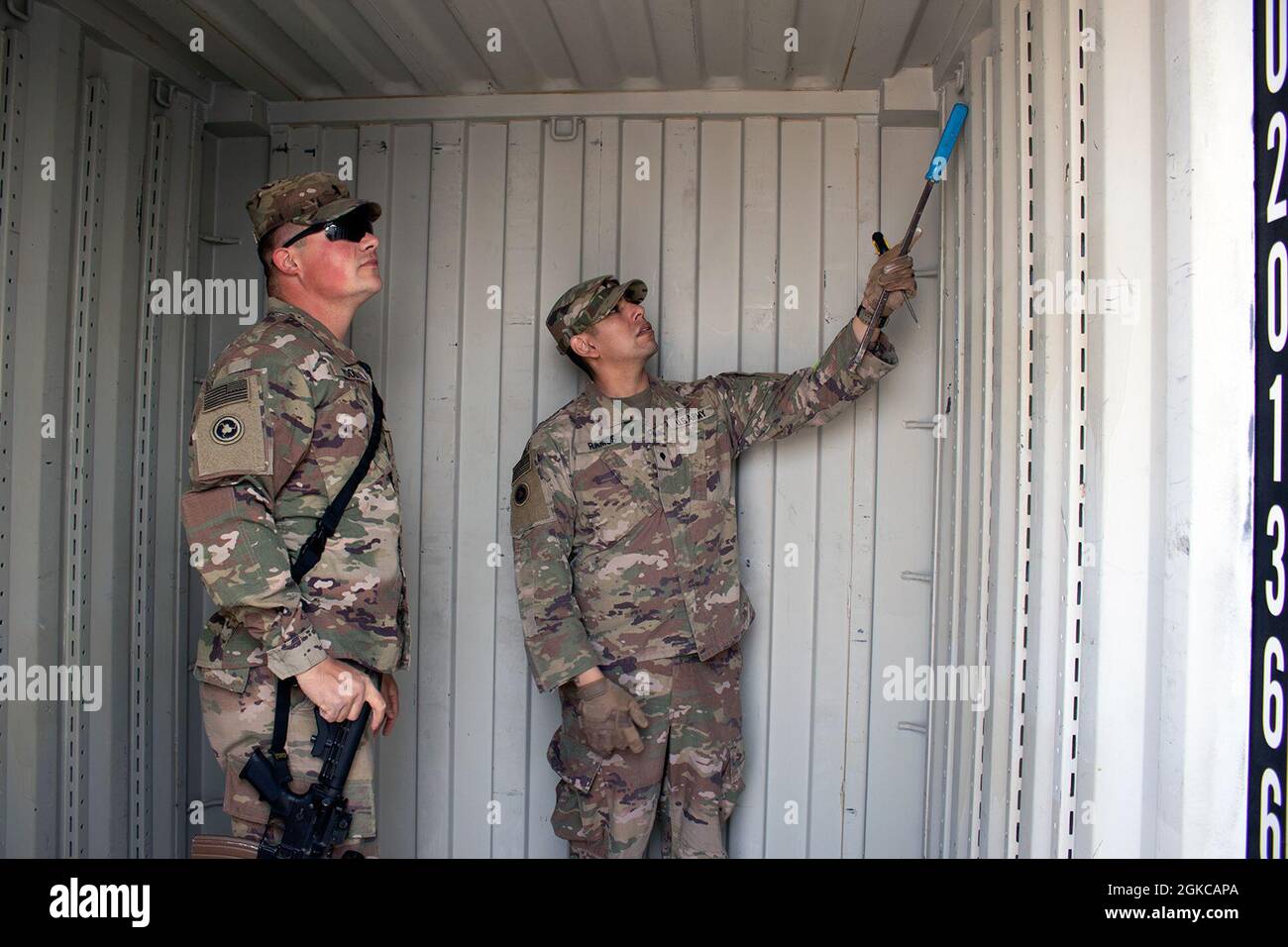 Spc. Vincent Pool and Spc. Daniel Ramos, transportation management ...