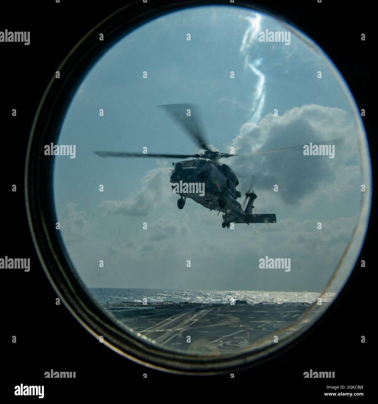 SOUTH CHINA SEA (March 11, 2021) An MH-60R Sea Hawk, assigned to the ...