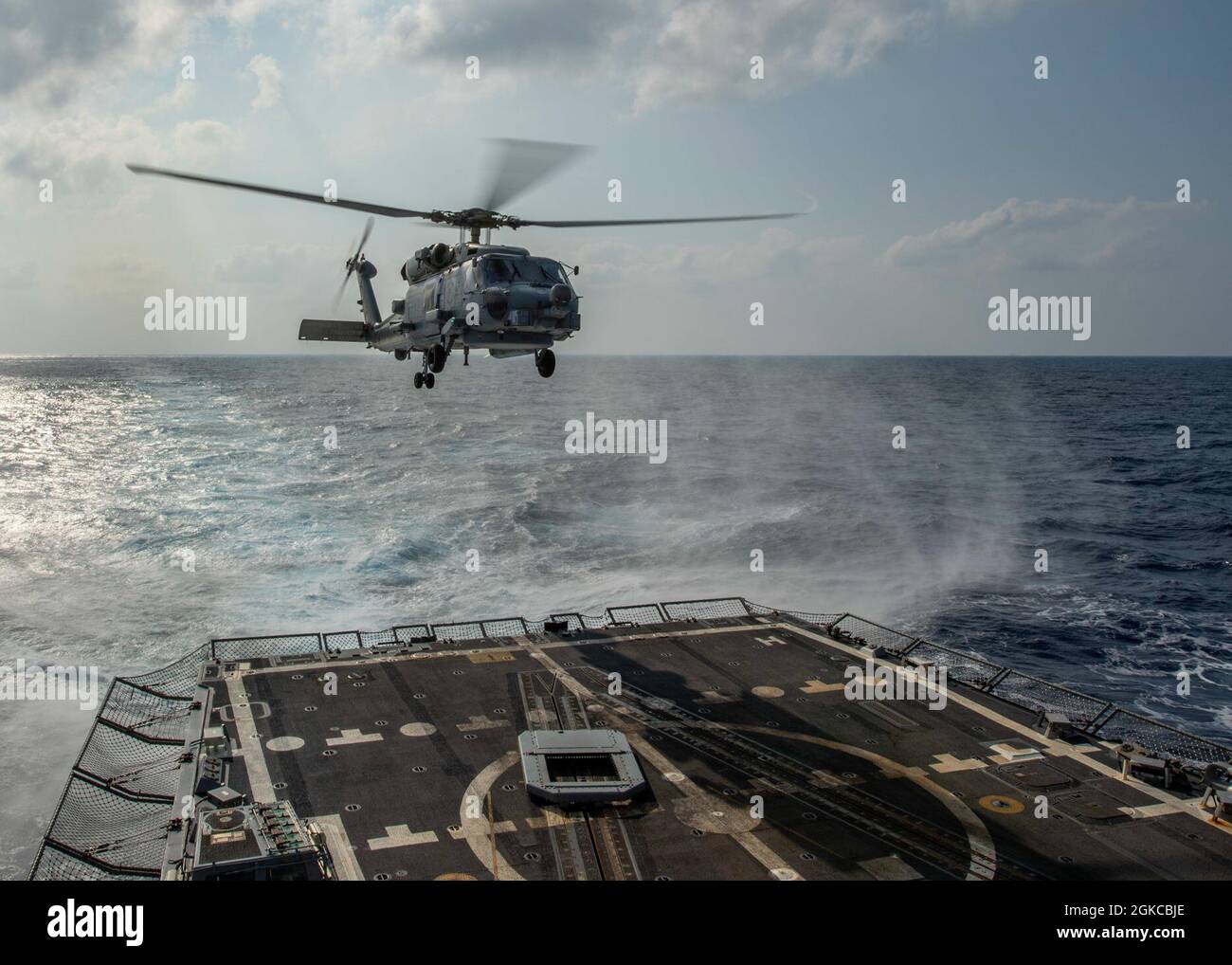 SOUTH CHINA SEA (March 11, 2021) An MH-60R Sea Hawk, assigned to the ...