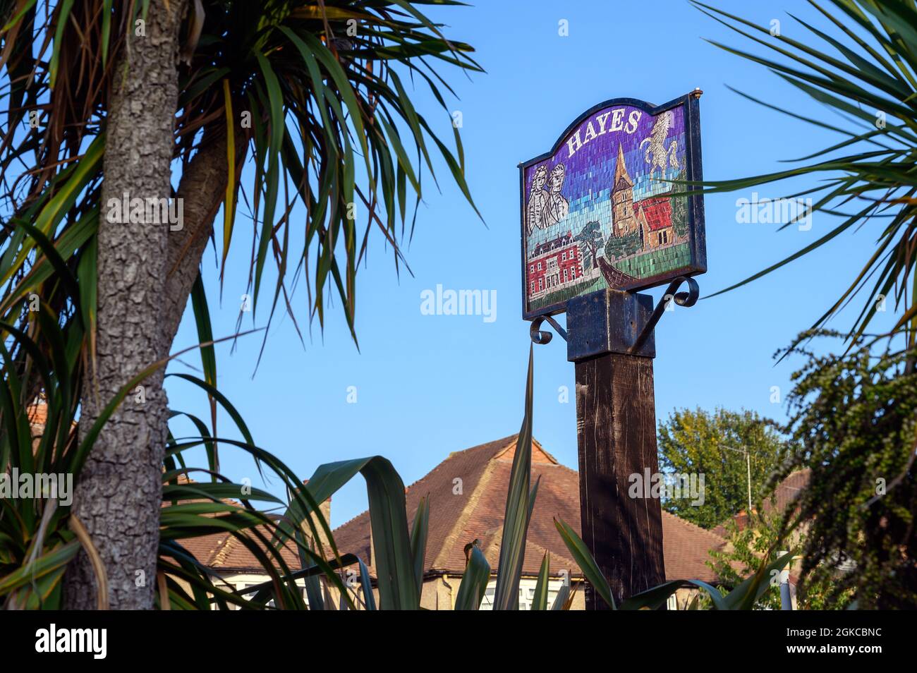 Historical old town sign in Hayes, Kent surrounded by trees. Sign ...